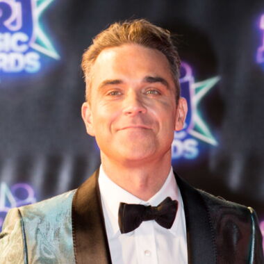 Robbie Williams - La biographie de Robbie Williams avec Voici.fr